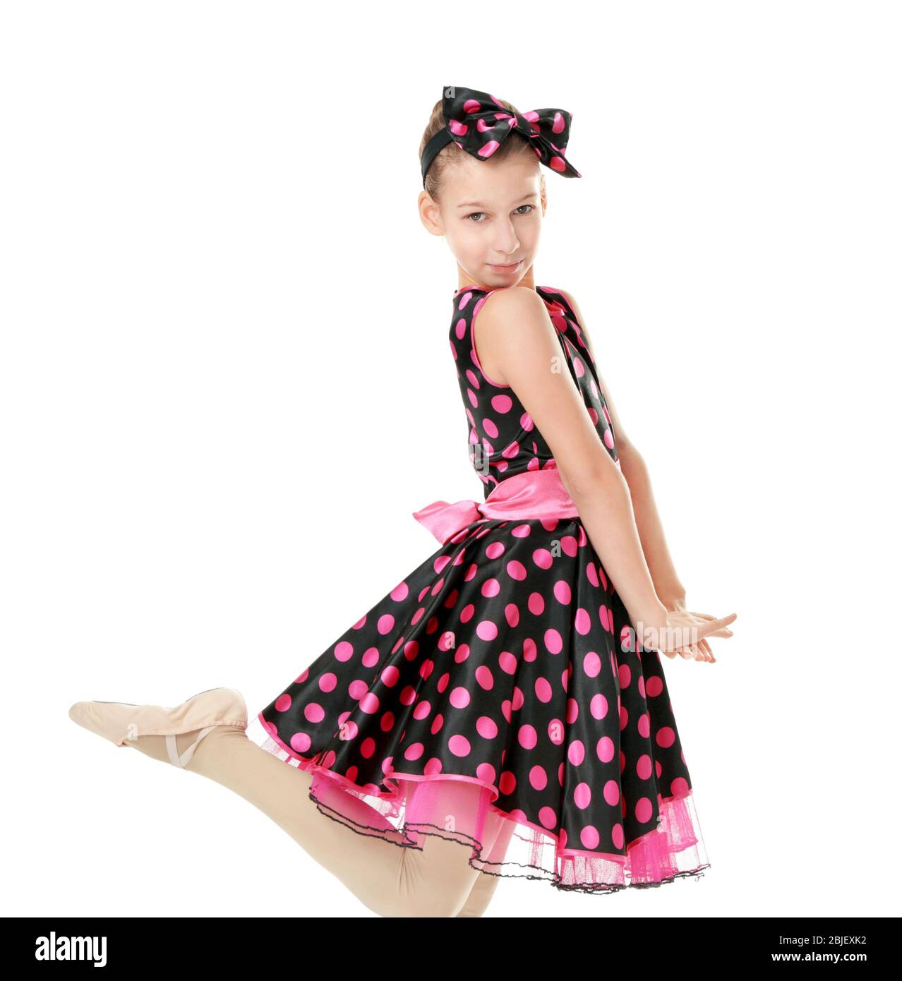 Cute little dancer on white background Stock Photo - Alamy