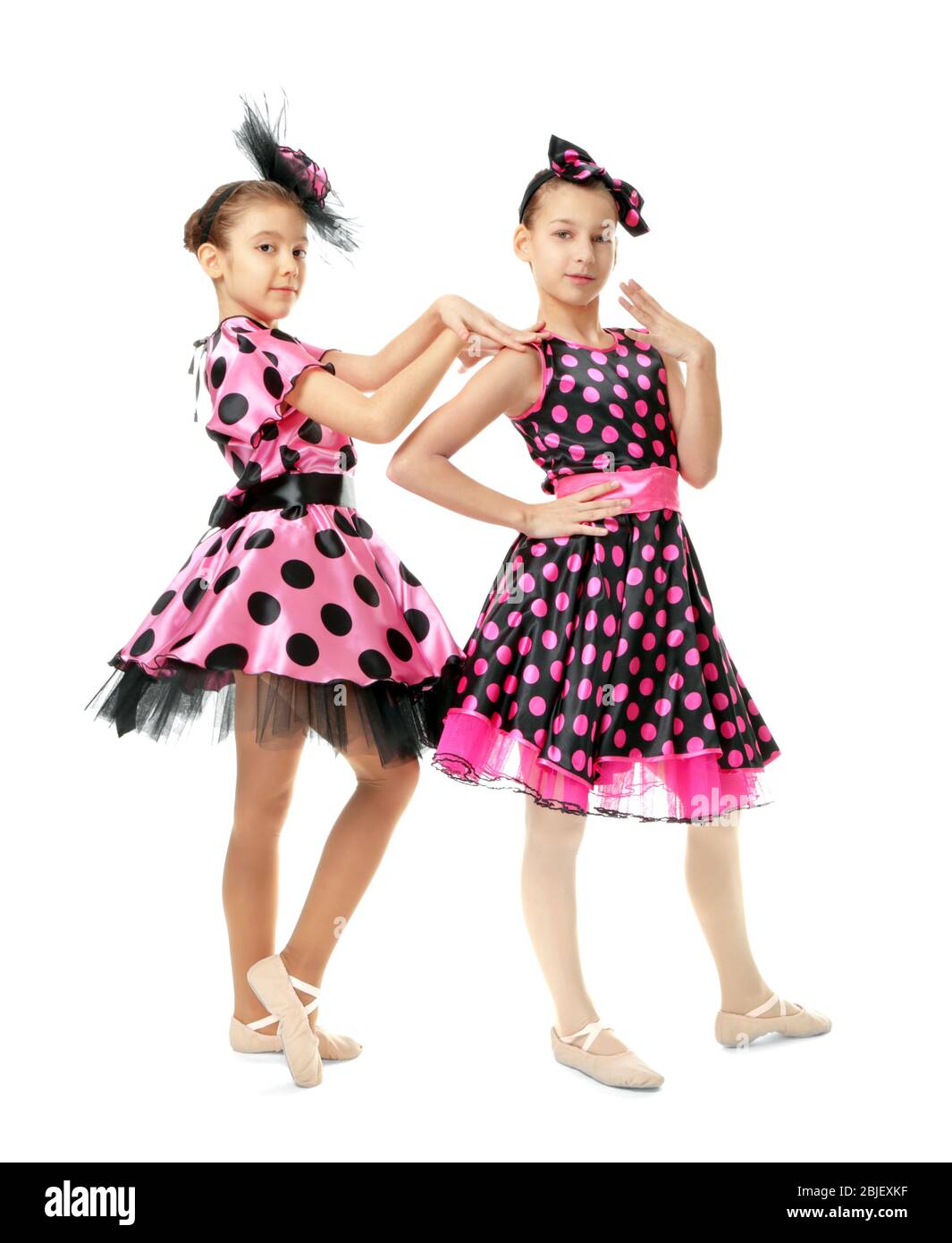 Cute little dancers on white background Stock Photo - Alamy