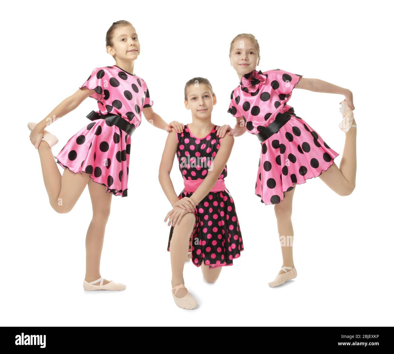 Cute little dancers on white background Stock Photo - Alamy