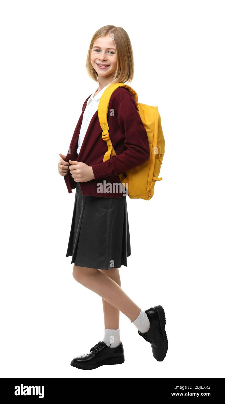Cute girl in school uniform with backpack on white background Stock ...