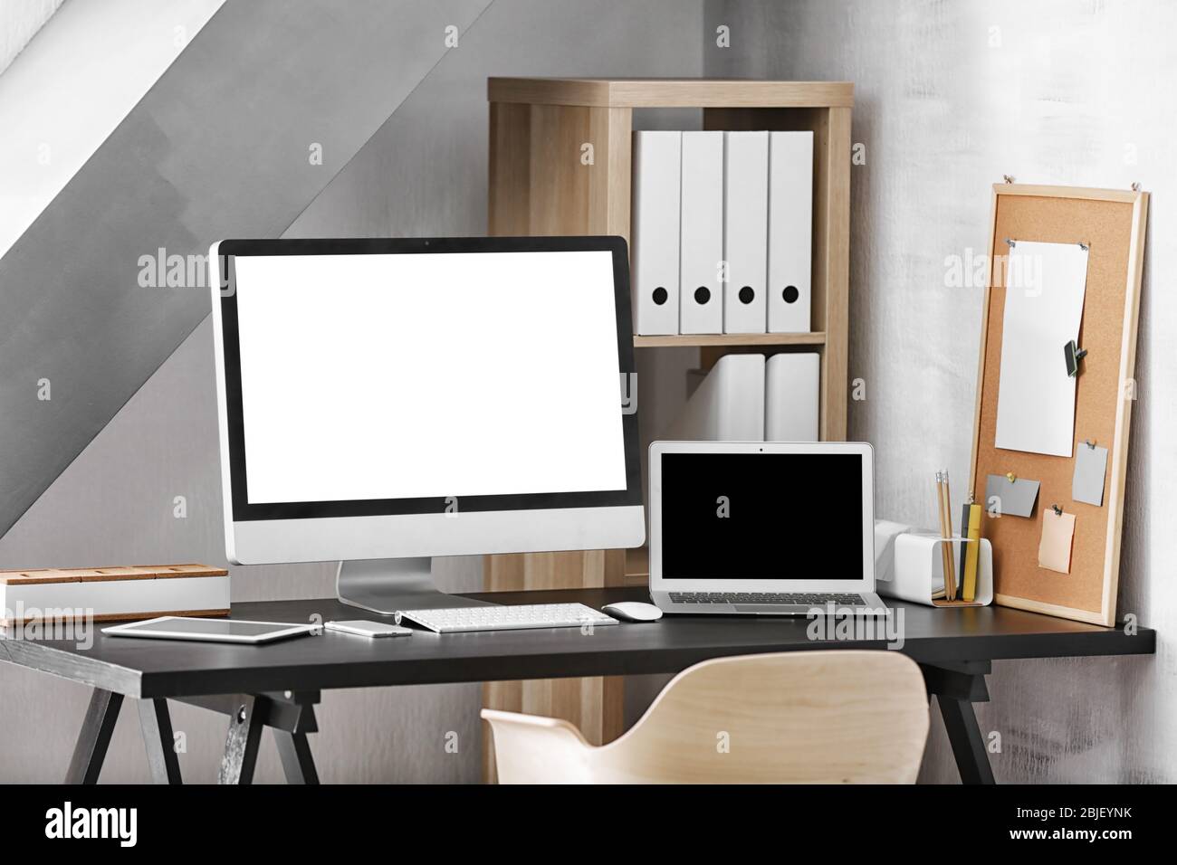 Modern design of workplace with big computer monitor Stock Photo - Alamy