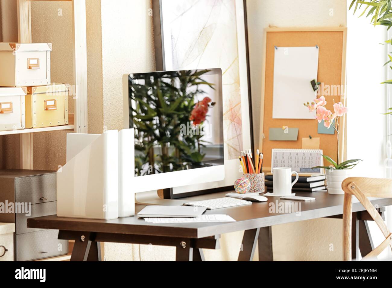 Modern design of workplace with big computer monitor Stock Photo - Alamy