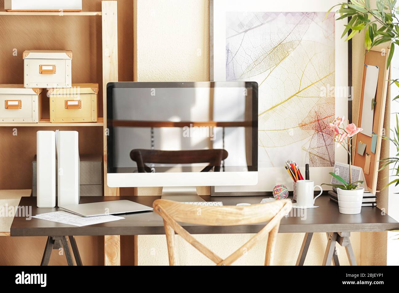 Modern design of workplace with big computer monitor Stock Photo - Alamy