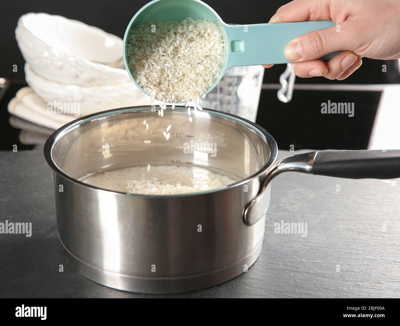 Saucepan filling with water hi-res stock photography and images - Alamy