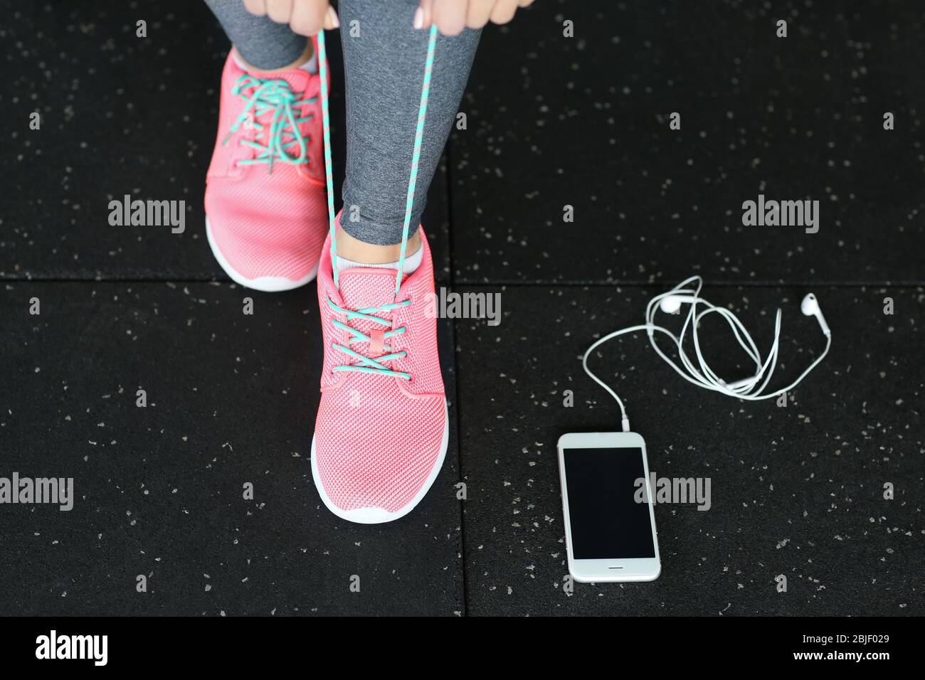 Hands mobile phone feet hi-res stock photography and images - Alamy