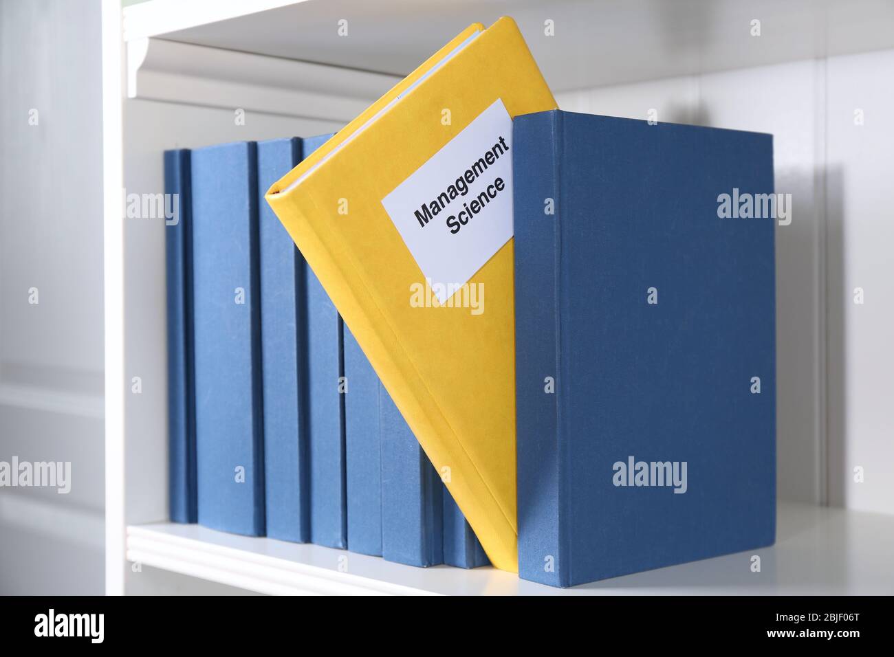 Book of MANAGEMENT SCIENCE on shelf Stock Photo - Alamy