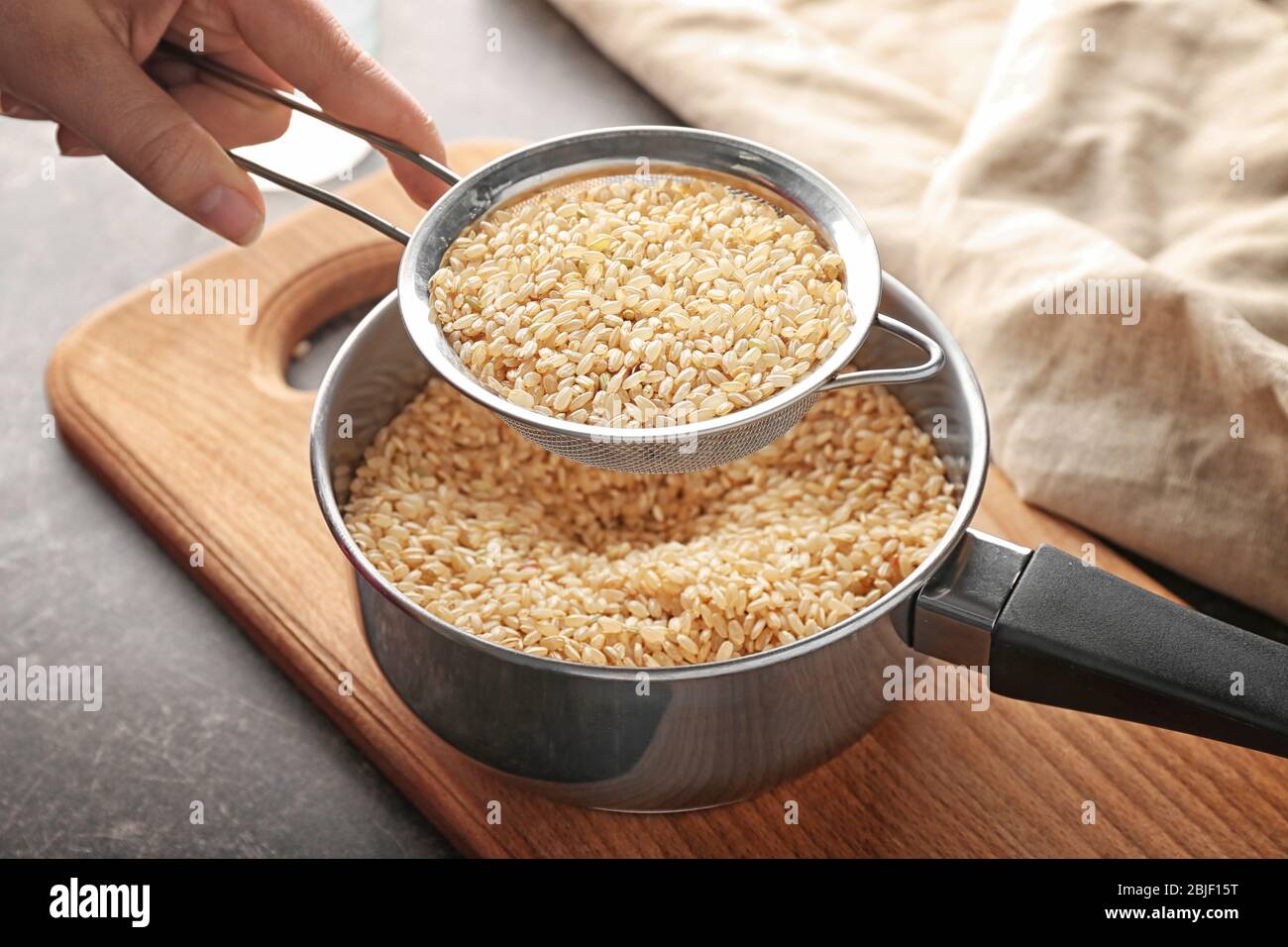 Rice sieve pan hi-res stock photography and images - Alamy