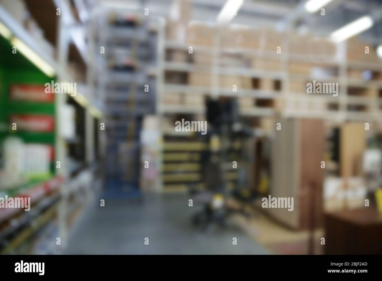 Blurred view of warehouse inventory Stock Photo - Alamy