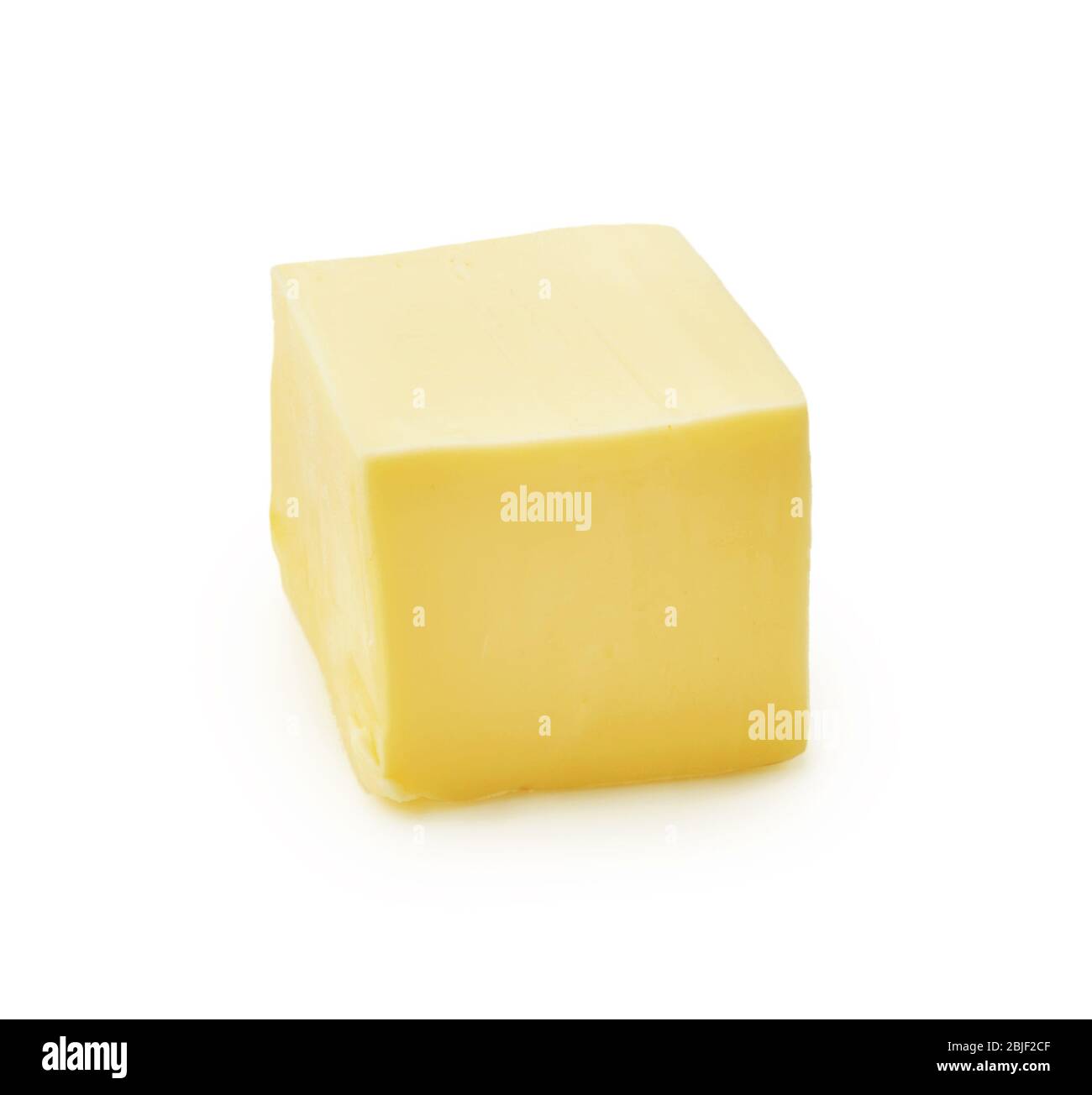 Piece of butter isolated on white background. Butter cube Stock Photo ...