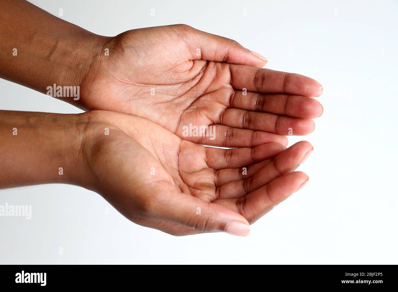 Hands begging hi-res stock photography and images - Alamy