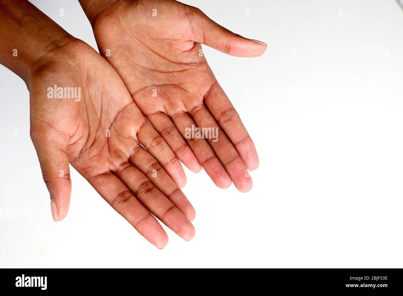 Hands begging hi-res stock photography and images - Alamy