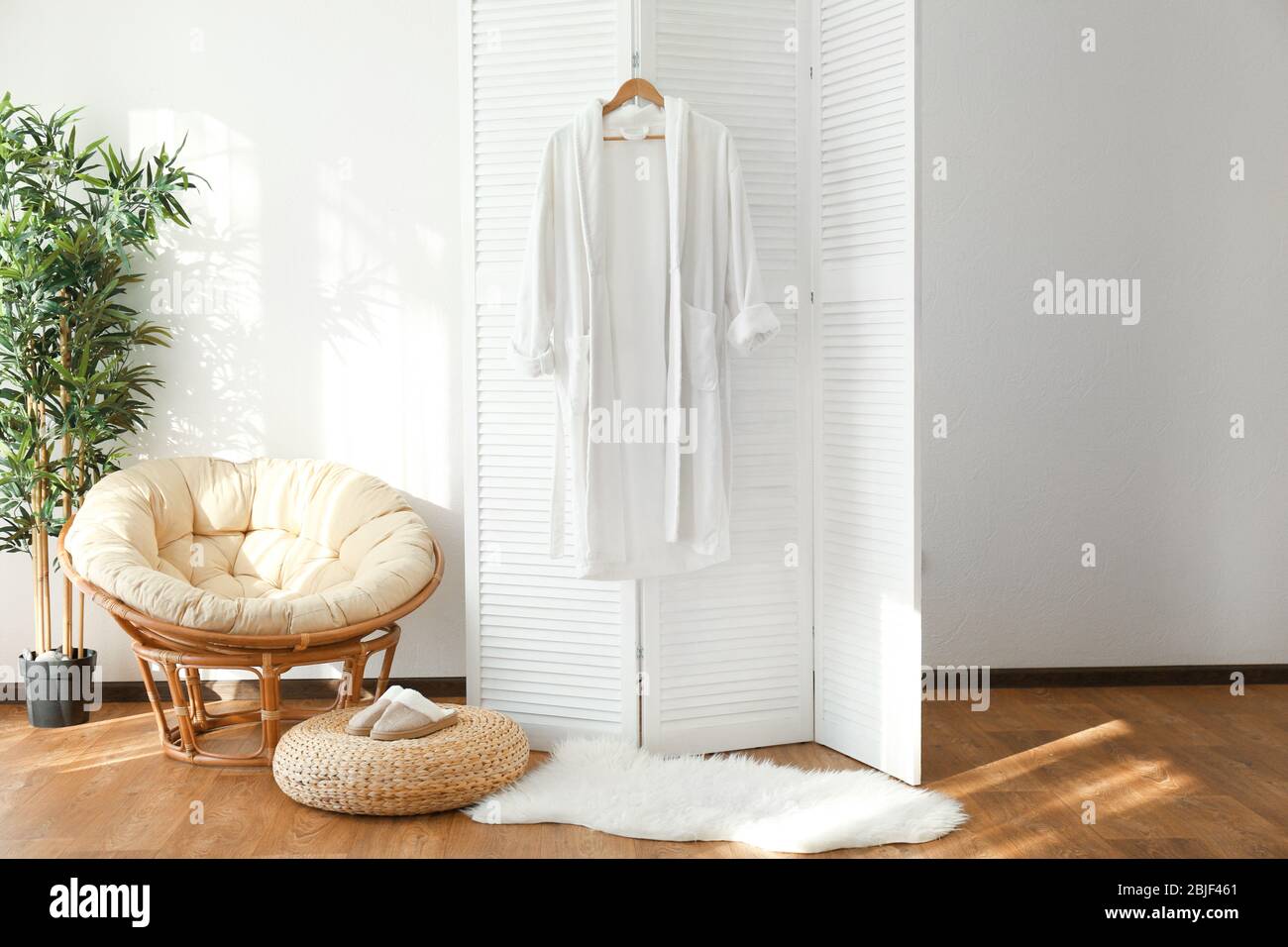 Light room interior with folding screen Stock Photo - Alamy
