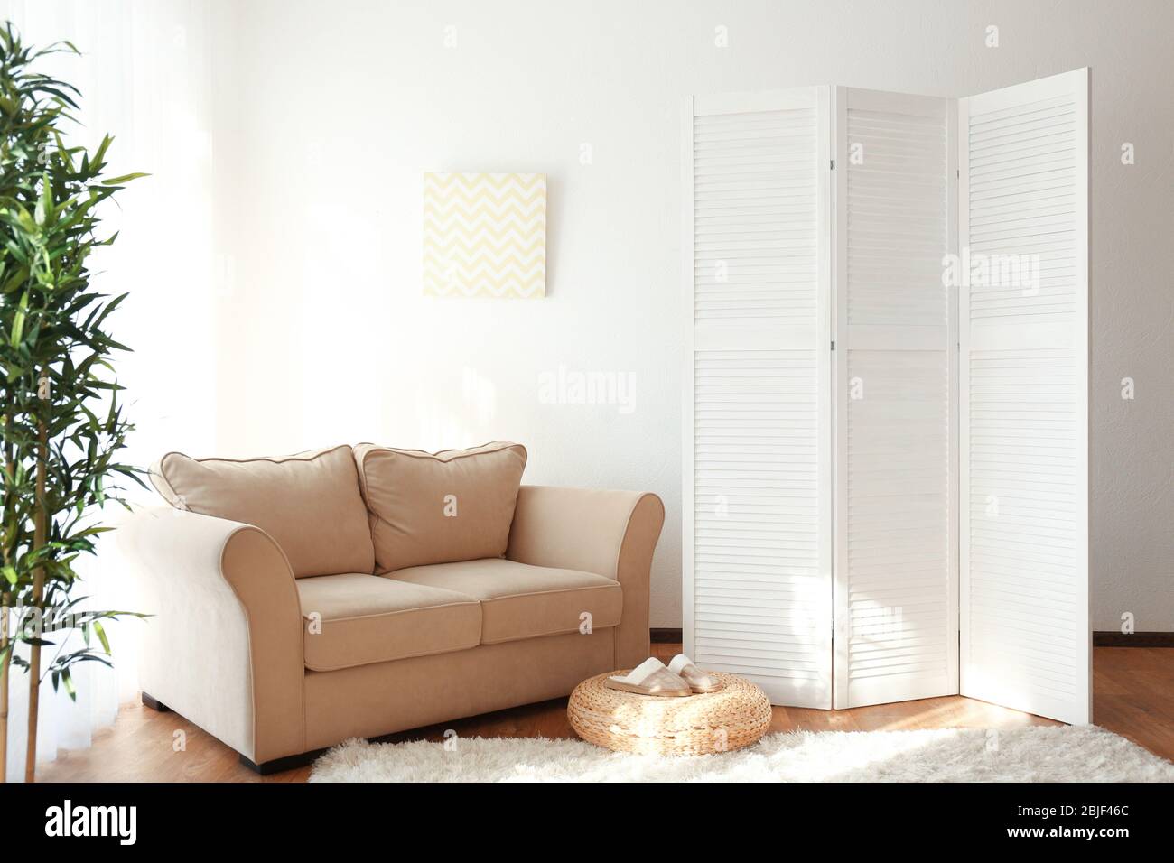 Light room interior with folding screen Stock Photo - Alamy