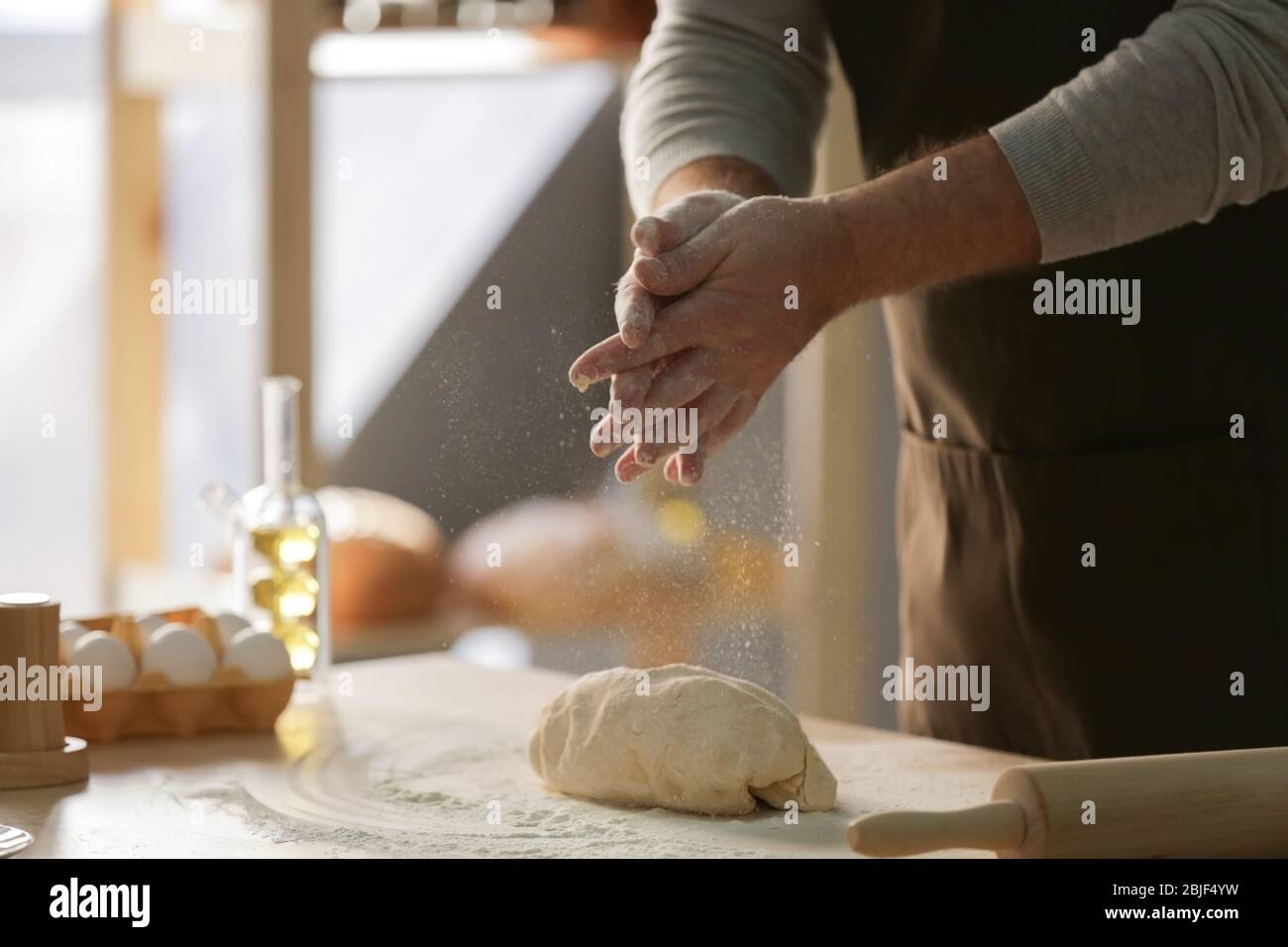Male cooker making tasty hi-res stock photography and images - Alamy
