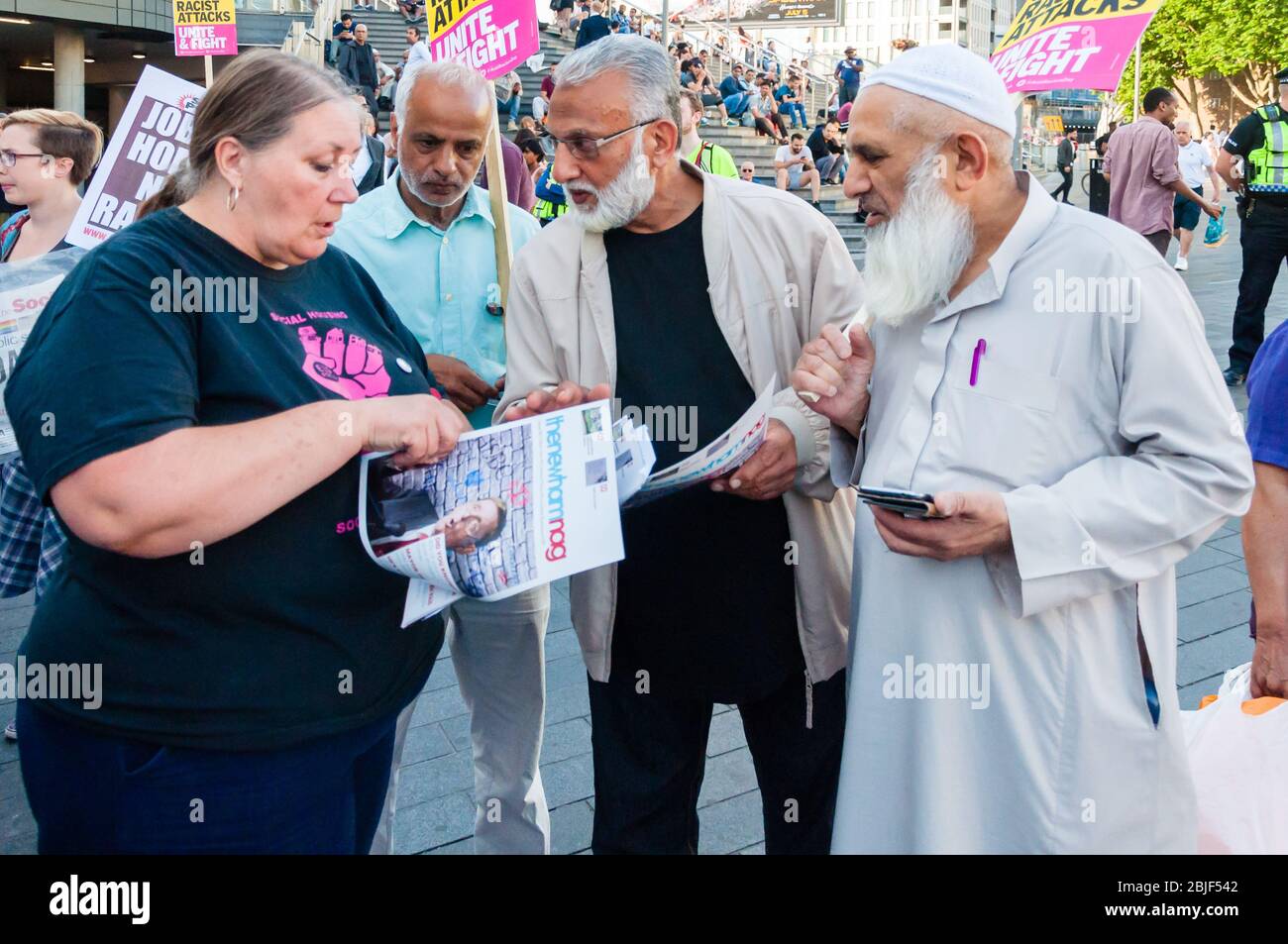"STOP ACID ATTACKS" protest outside the Stratford station in East ...