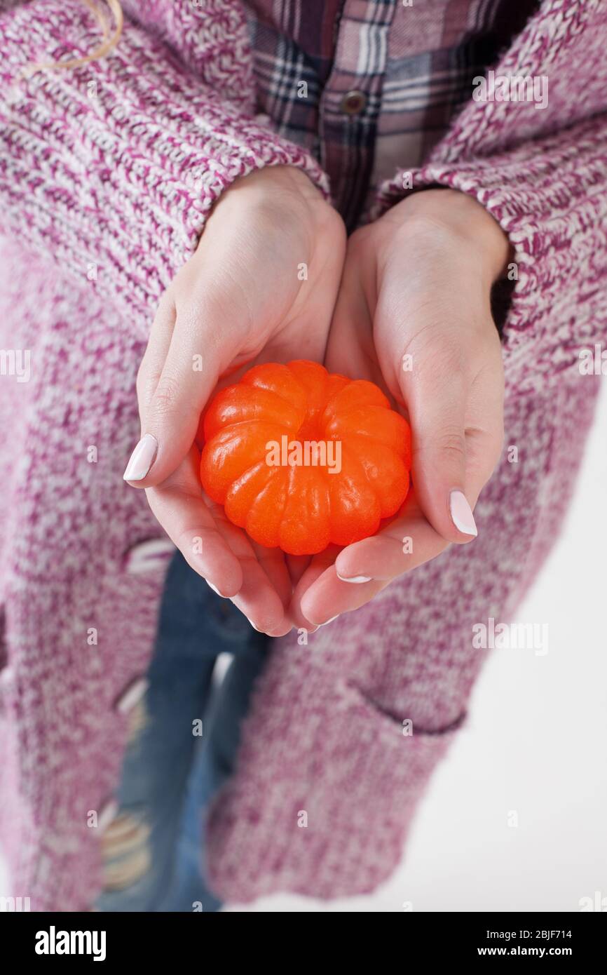 Holding orange mandarine hi-res stock photography and images - Alamy