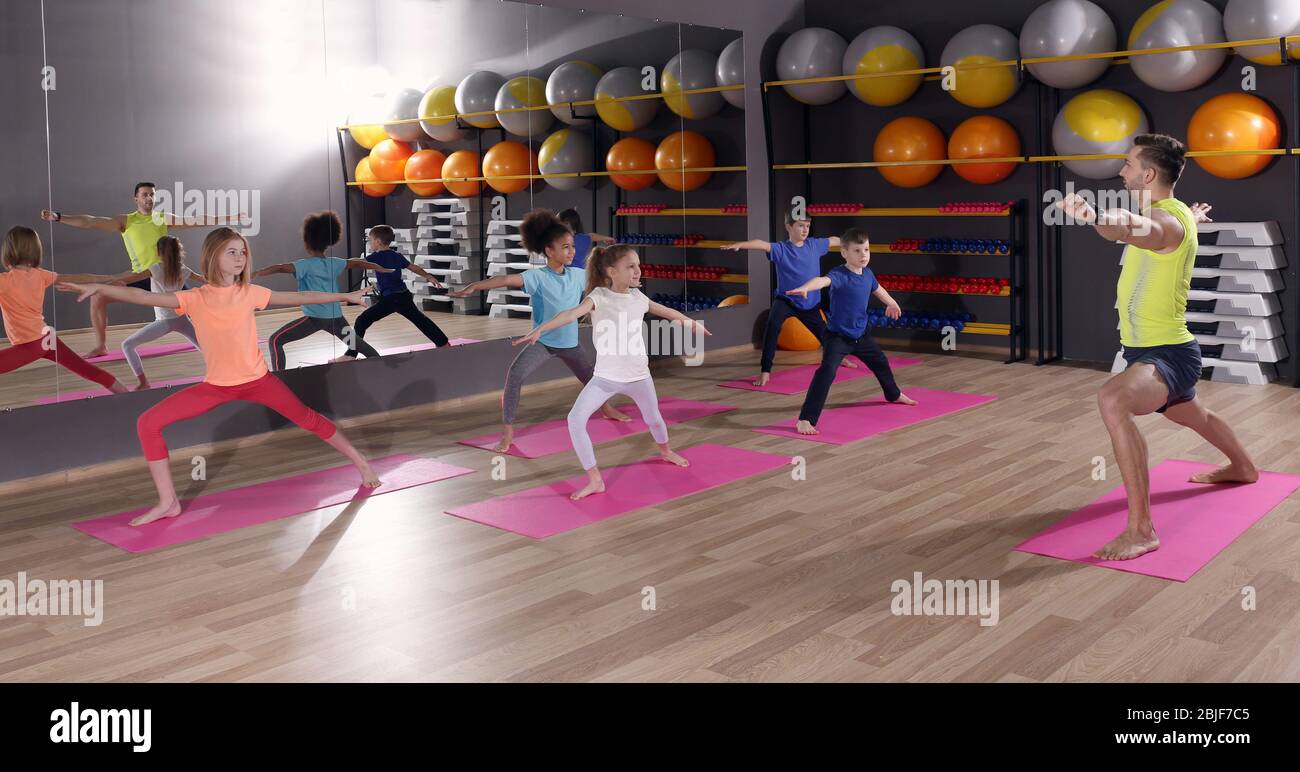 Children at physical education lesson in school gym Stock Photo - Alamy