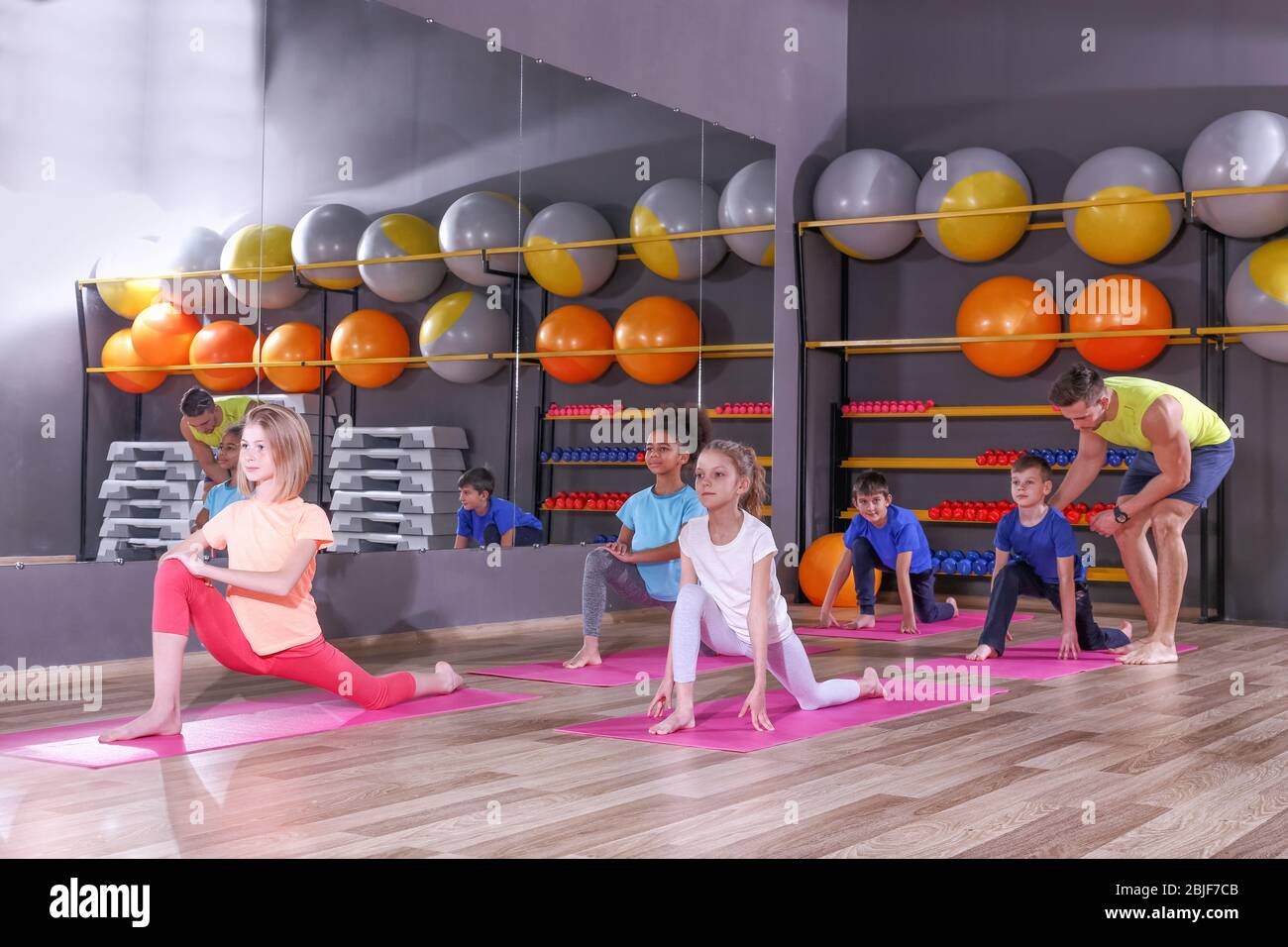 Children at physical education lesson in school gym Stock Photo - Alamy