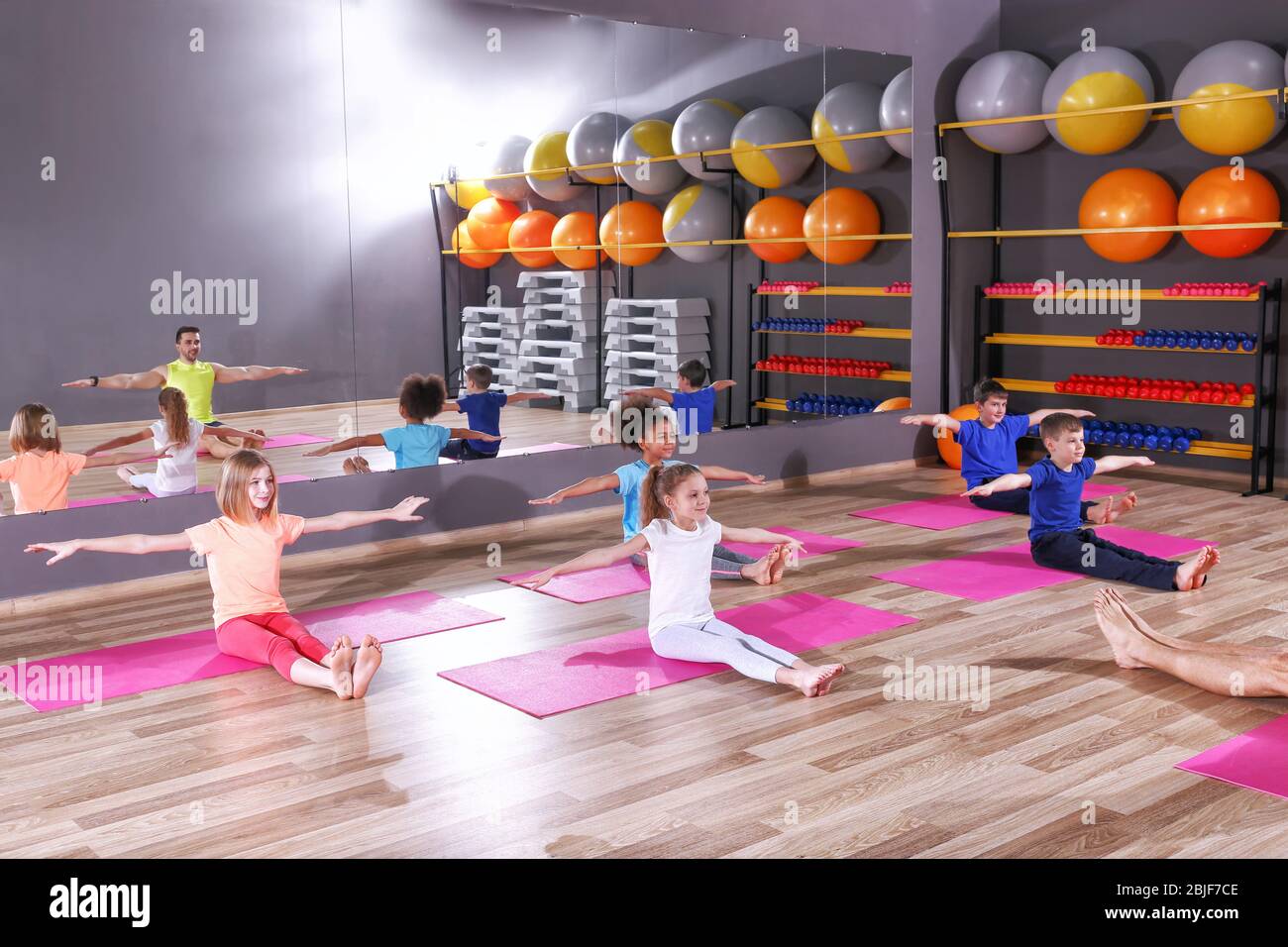 Children at physical education lesson in school gym Stock Photo - Alamy