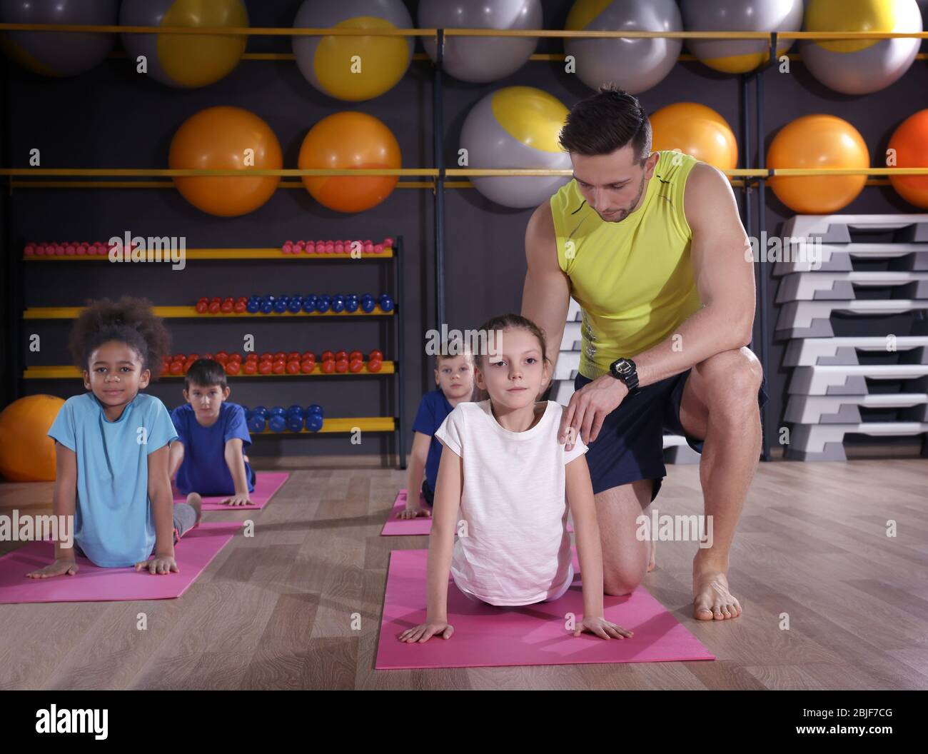 Children at physical education lesson in school gym Stock Photo - Alamy