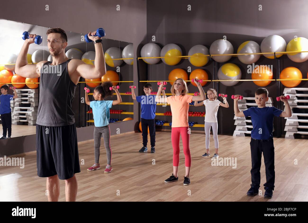 Children at physical education lesson in school gym Stock Photo - Alamy