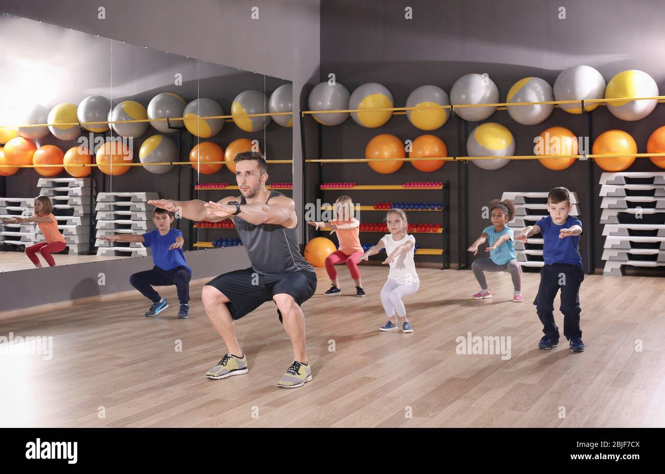 Children at physical education lesson in school gym Stock Photo - Alamy