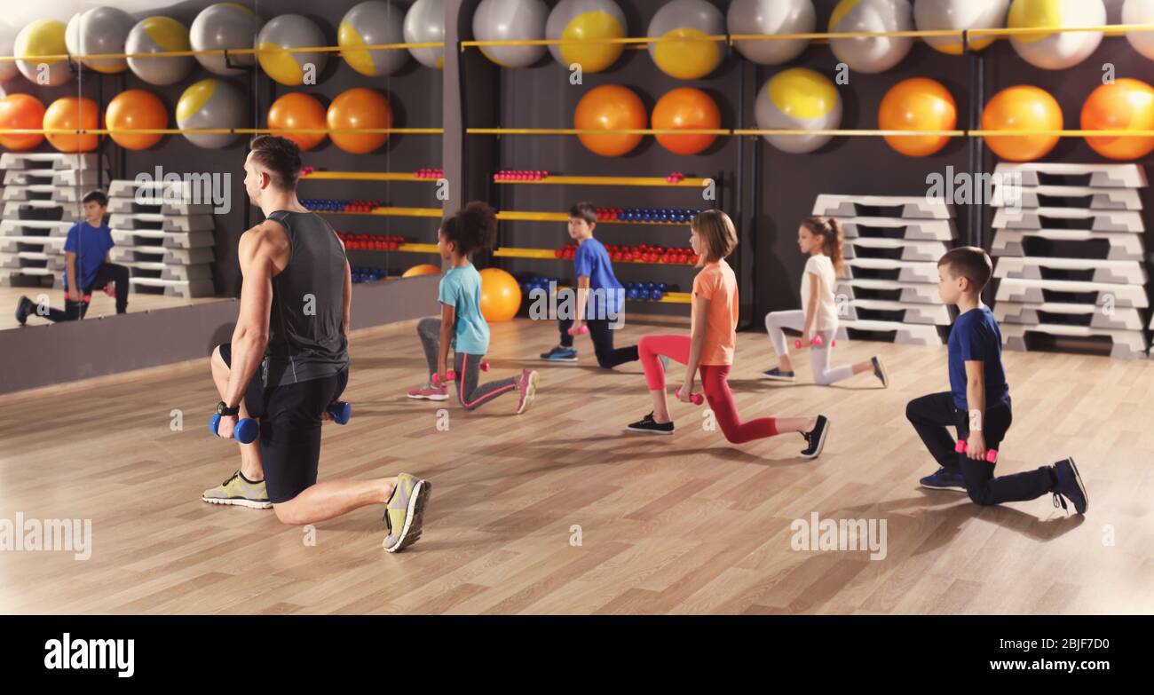 Children at physical education lesson in school gym Stock Photo - Alamy