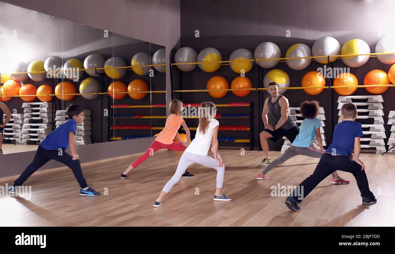 Children at physical education lesson in school gym Stock Photo - Alamy