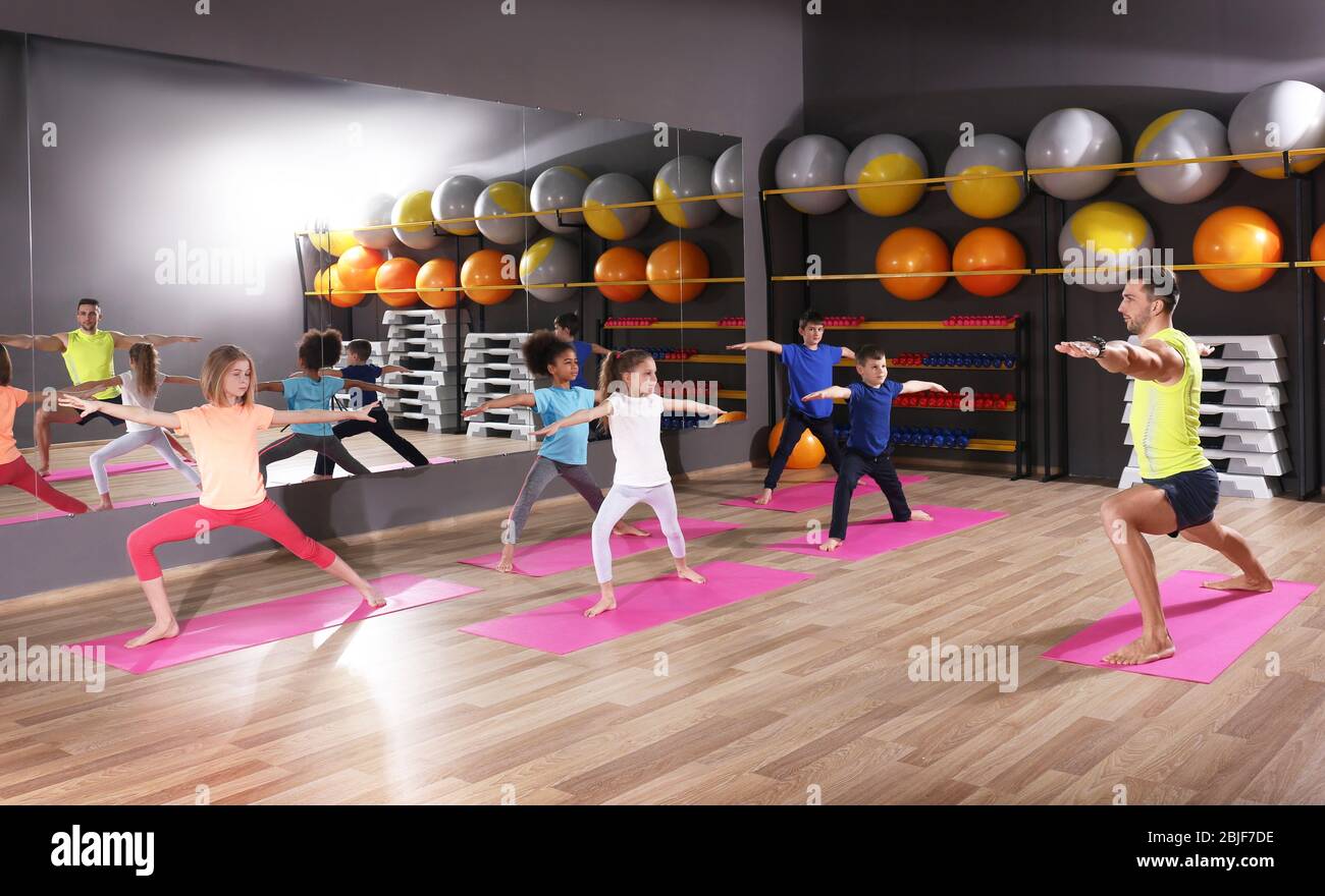 Children at physical education lesson in school gym Stock Photo - Alamy