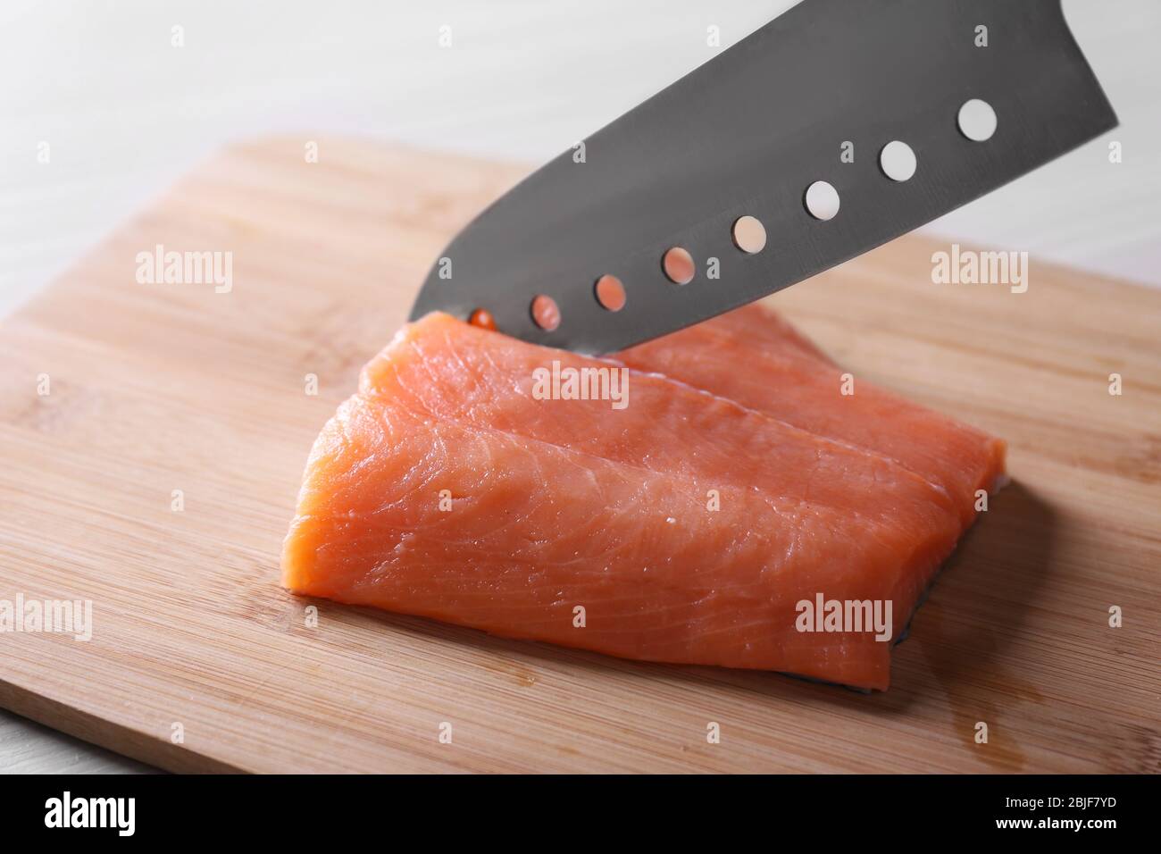 Slicing fish fillet on cutting hi-res stock photography and images - Alamy