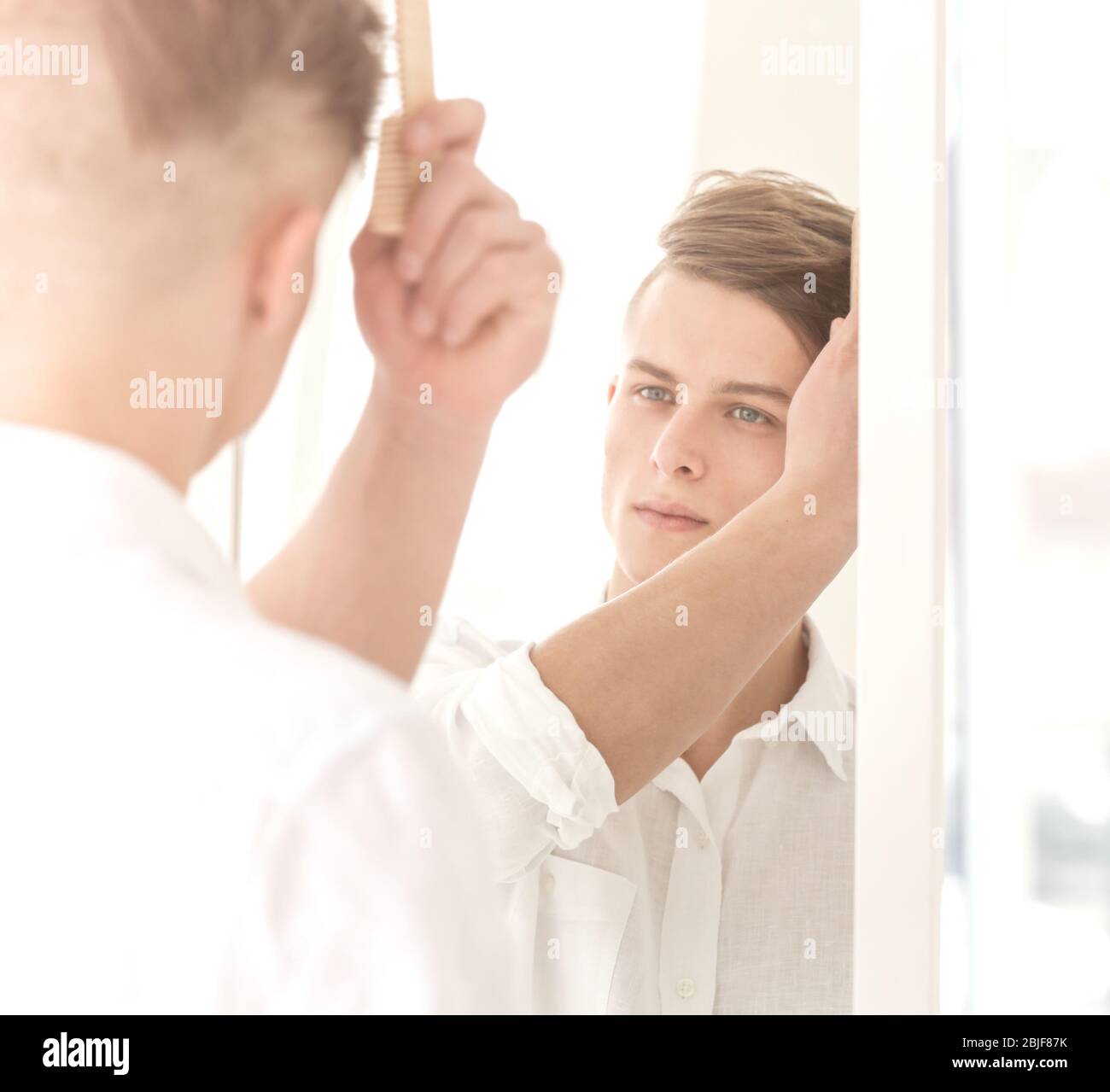 Hairdresser mask cuts hair hi-res stock photography and images - Alamy