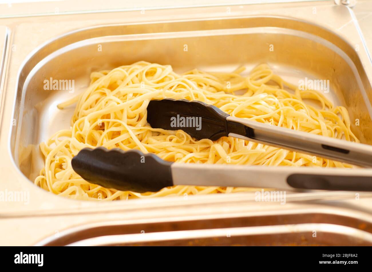 Spaghetti tong hi-res stock photography and images - Alamy