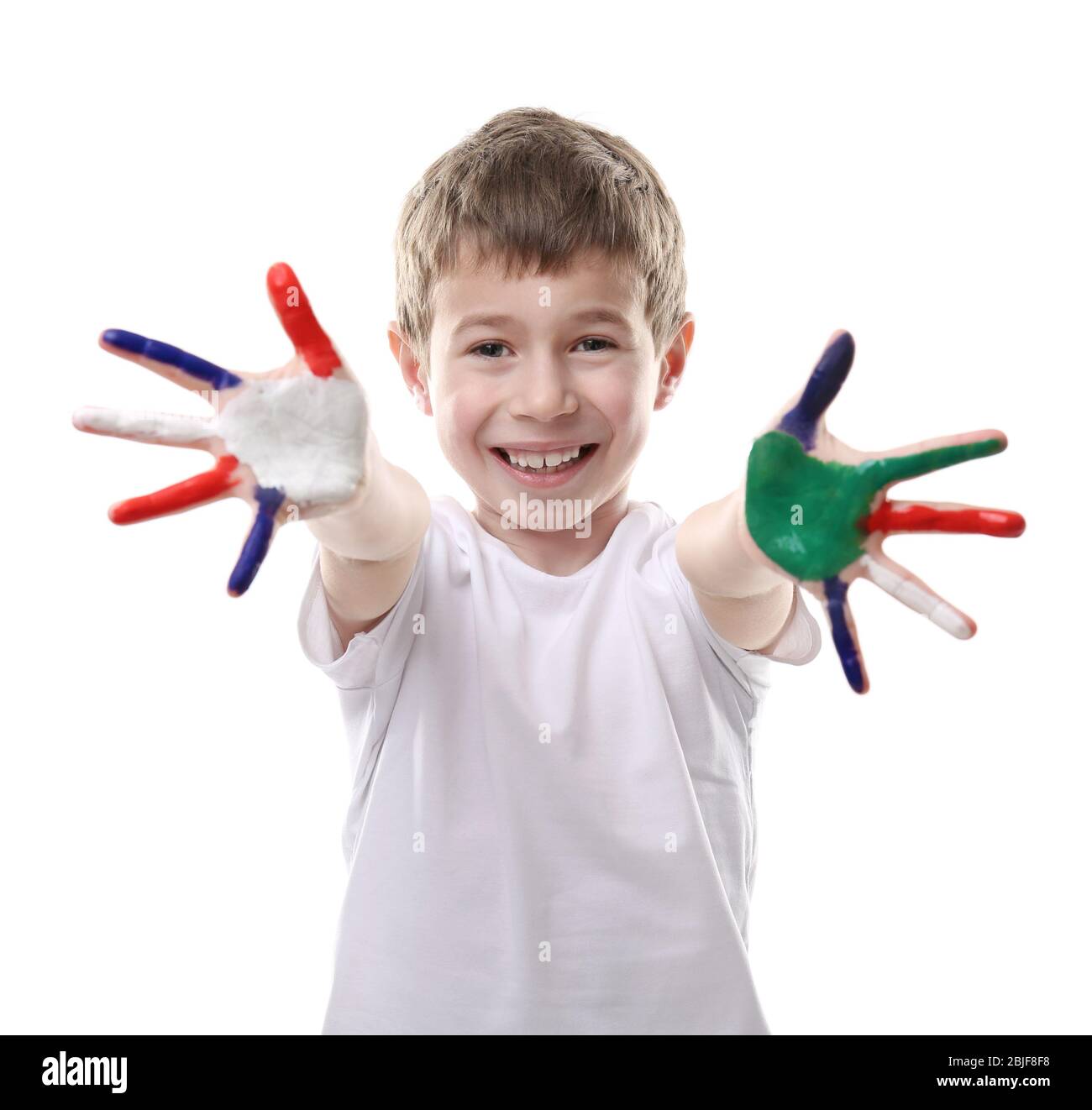Little boy with hands in colorful paints isolated on white Stock Photo ...