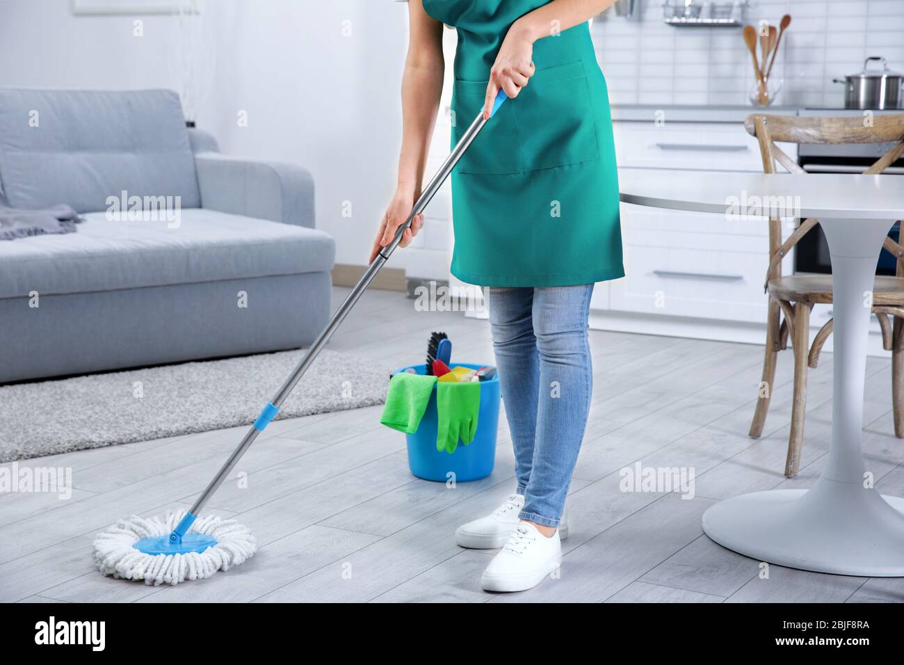 Woman legs mop bucket hi-res stock photography and images - Alamy