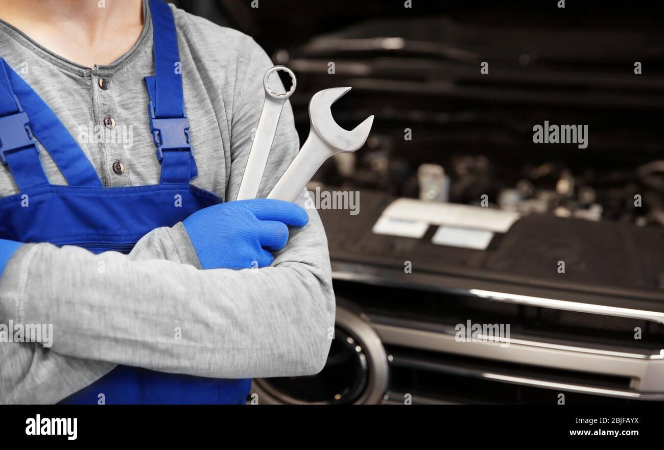 Mechanic in uniform tools hi-res stock photography and images - Alamy