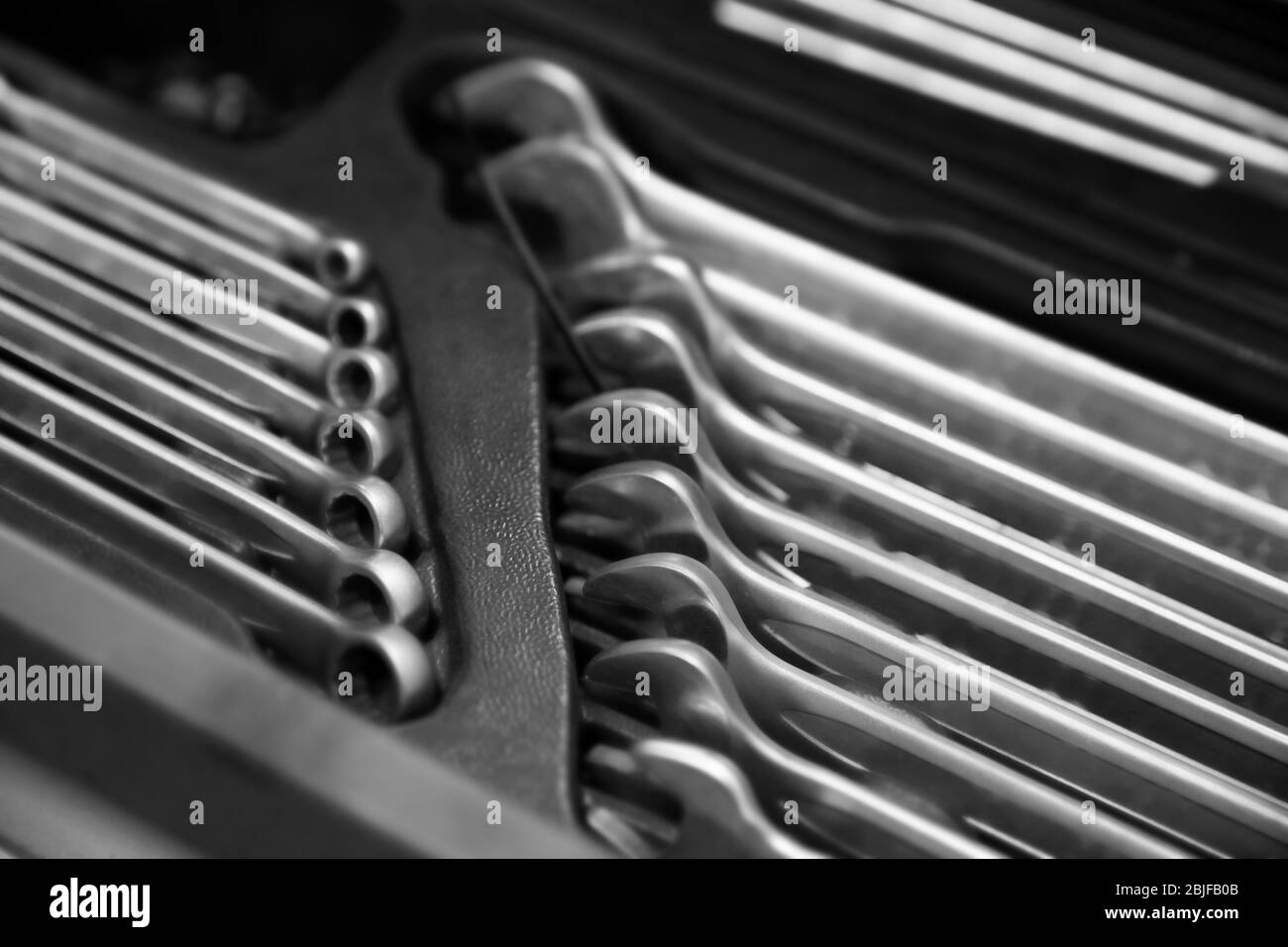 Tools box with wrenches, closeup Stock Photo - Alamy