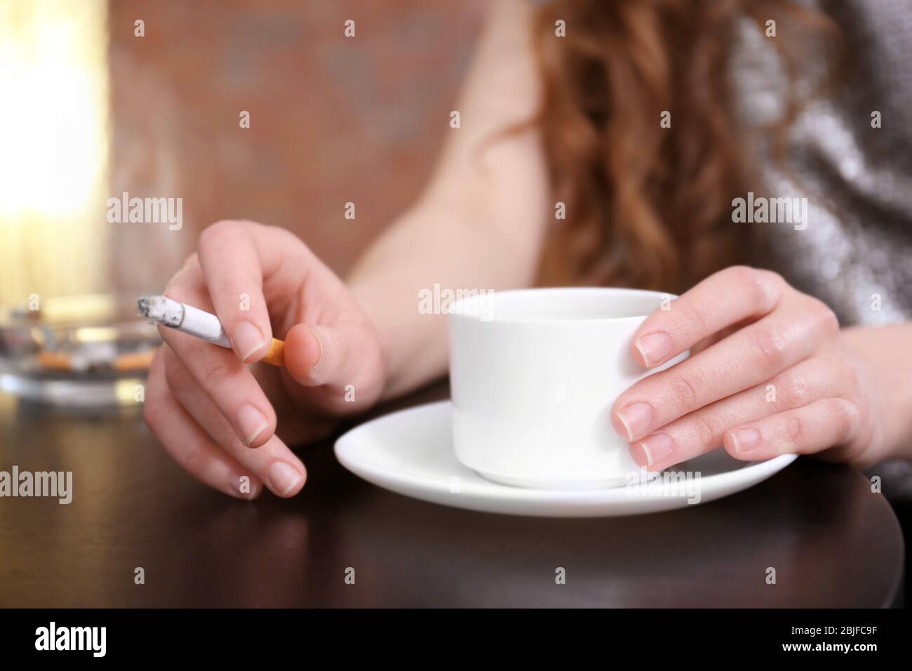 Cup with cigarettes hi-res stock photography and images - Alamy