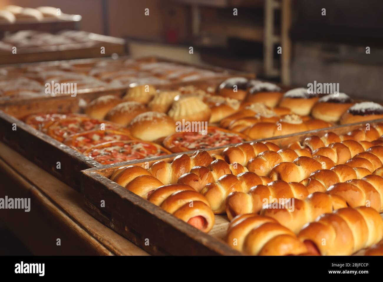 Wooden pallets with bakery products Stock Photo - Alamy