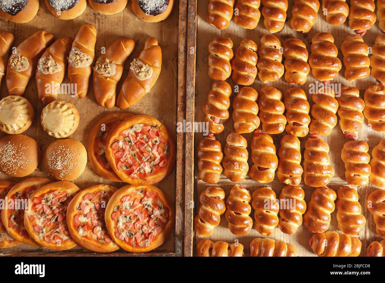 Wooden pallets with bakery products Stock Photo - Alamy