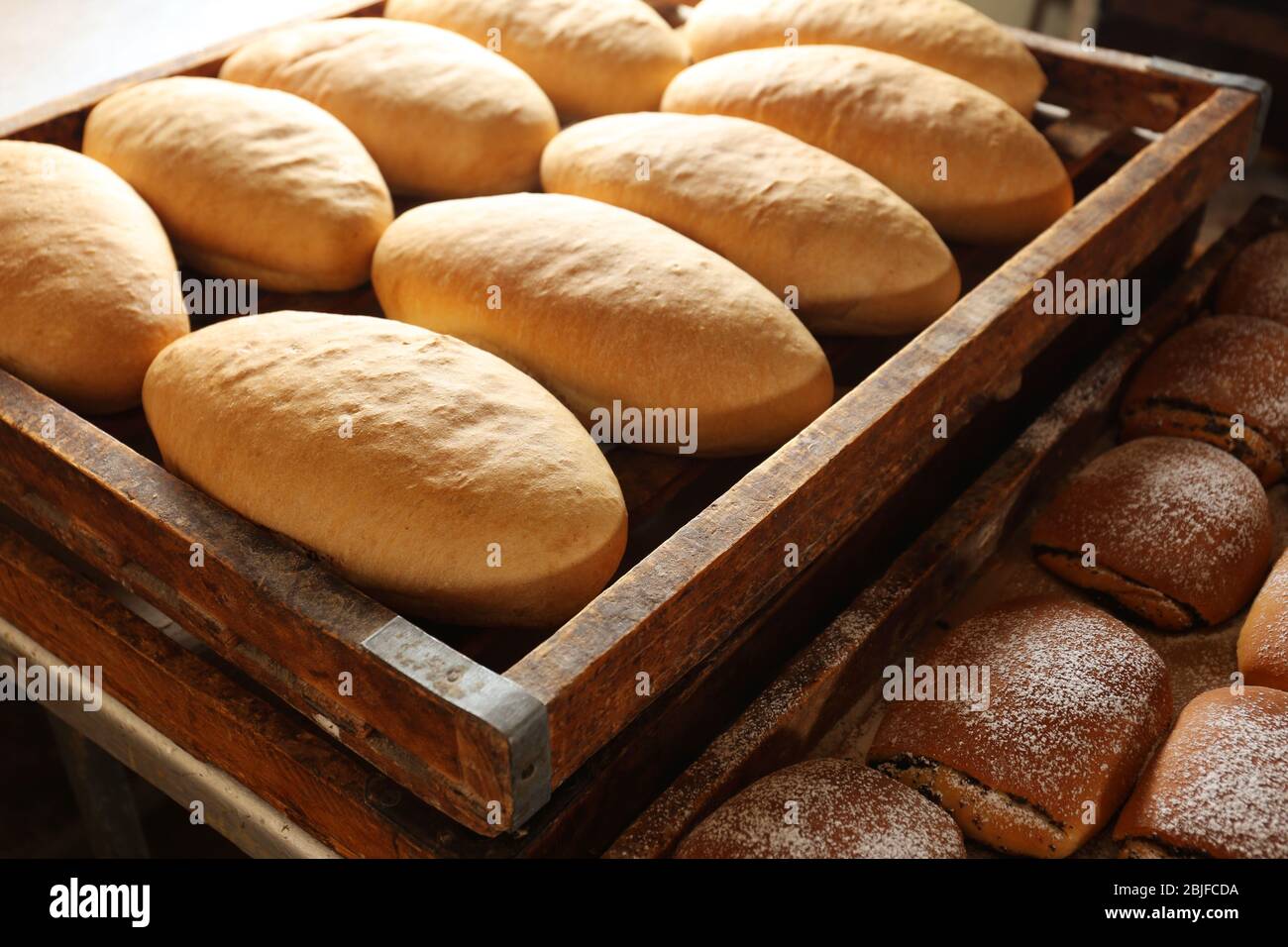 Wooden pallets with bakery products Stock Photo - Alamy