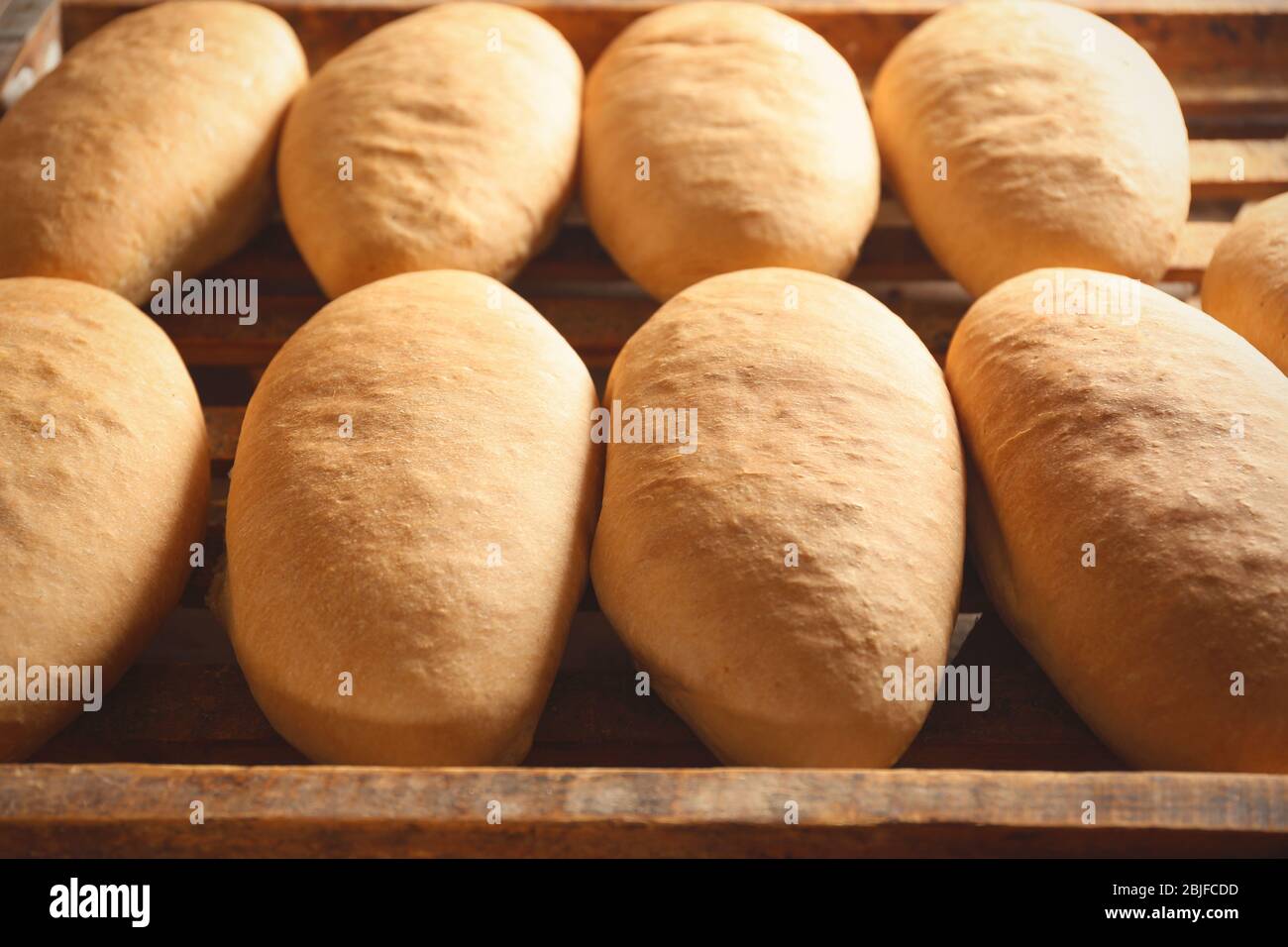 Wooden pallet with bread, closeup Stock Photo - Alamy