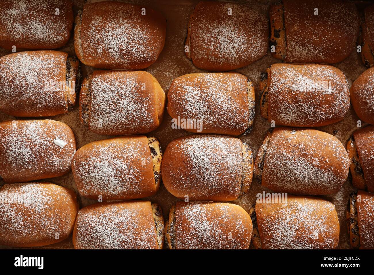 Wooden pallet with buns, closeup Stock Photo - Alamy