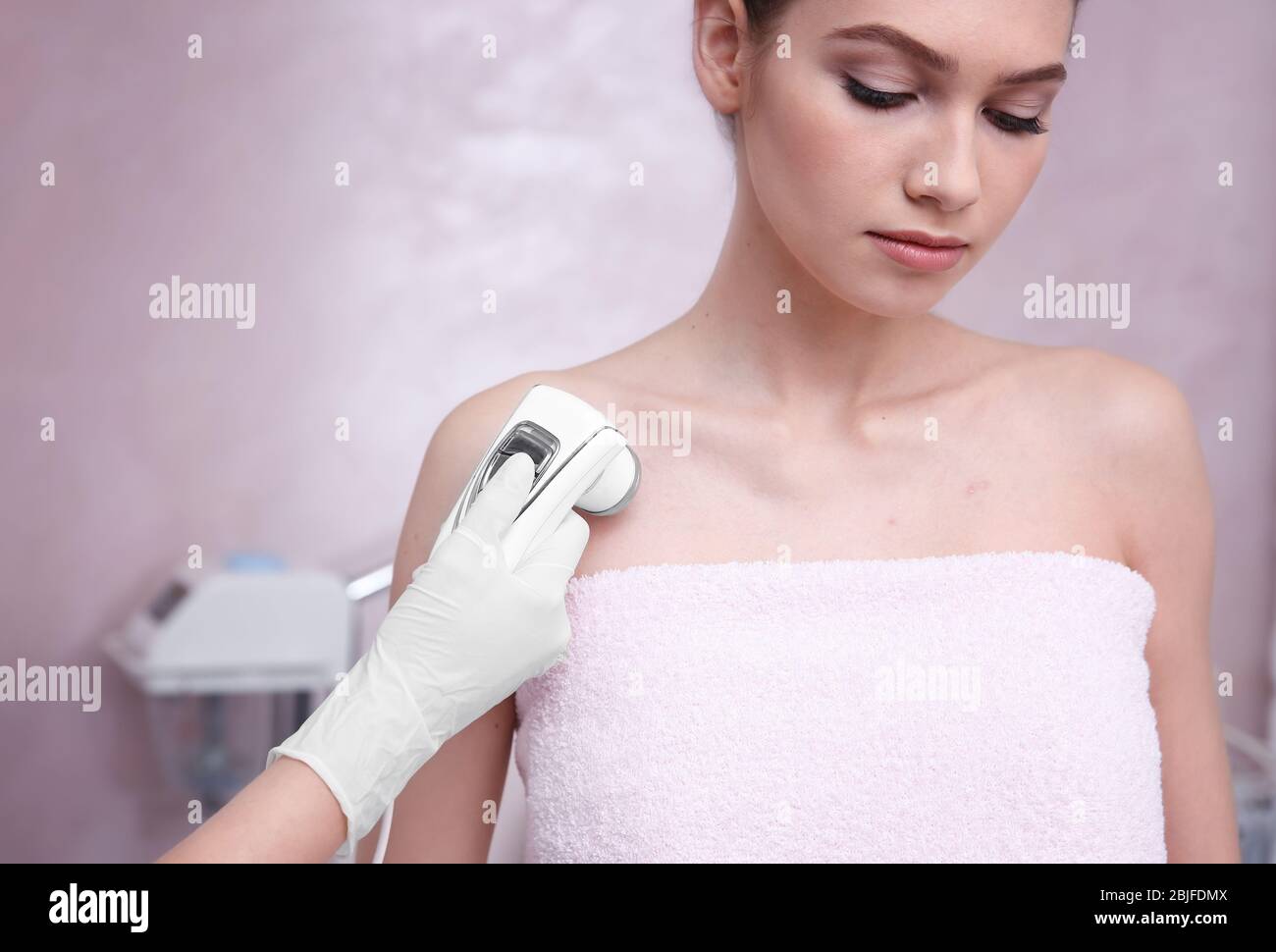 Woman visiting dermatologist at clinic Stock Photo - Alamy