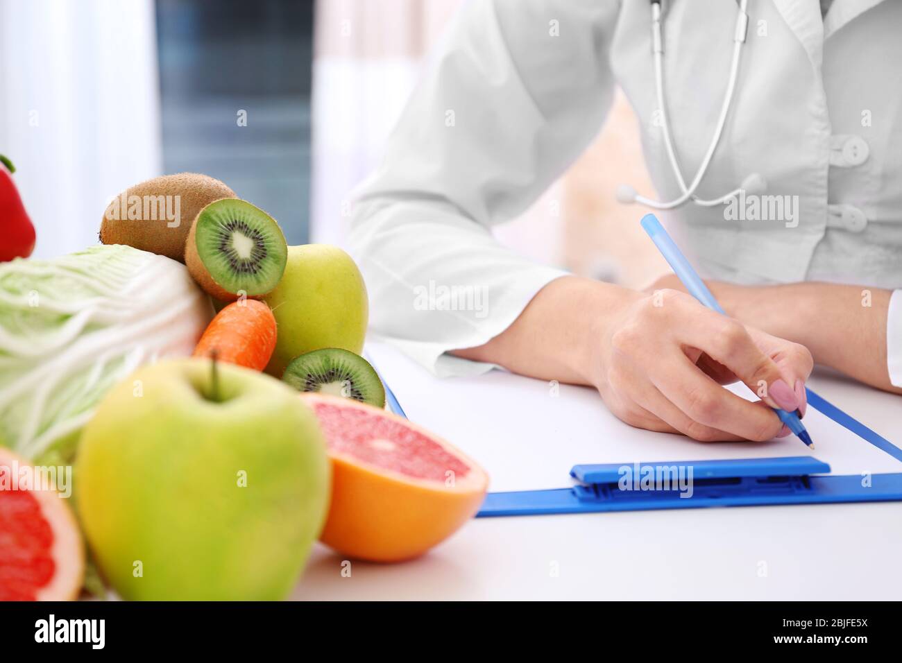 Dietitian writing diet plan hi-res stock photography and images - Alamy