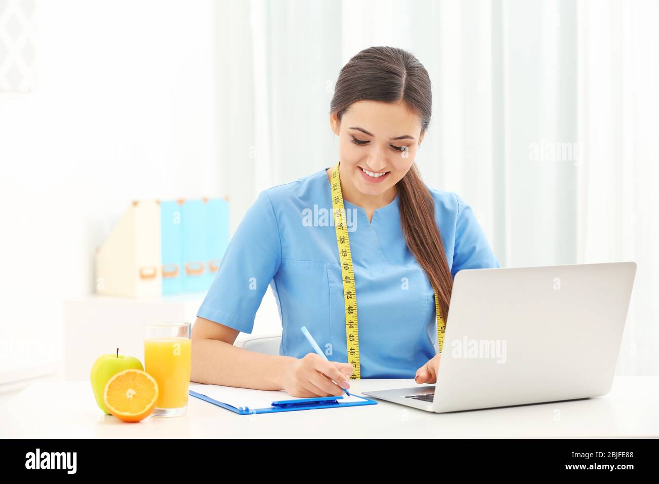 Dietitian writing diet plan hi-res stock photography and images - Alamy