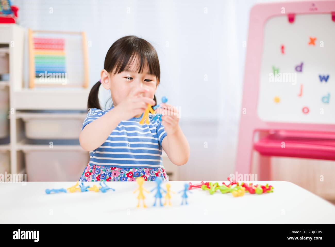 toddler girl learning counting and math for homeschooling Stock Photo ...