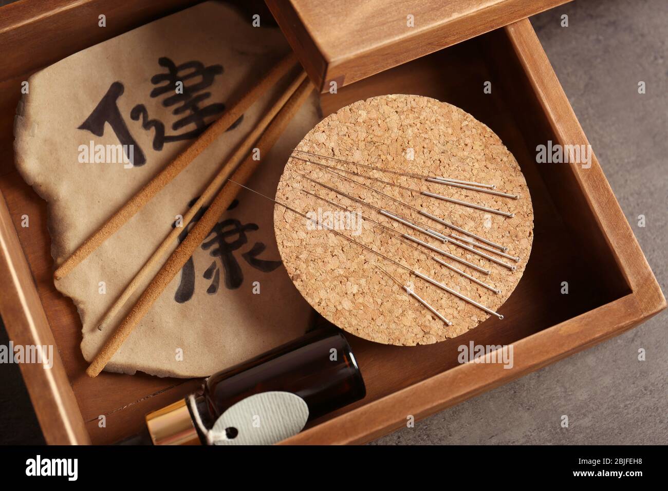 Professional wooden box with needles and tools for acupuncture ...