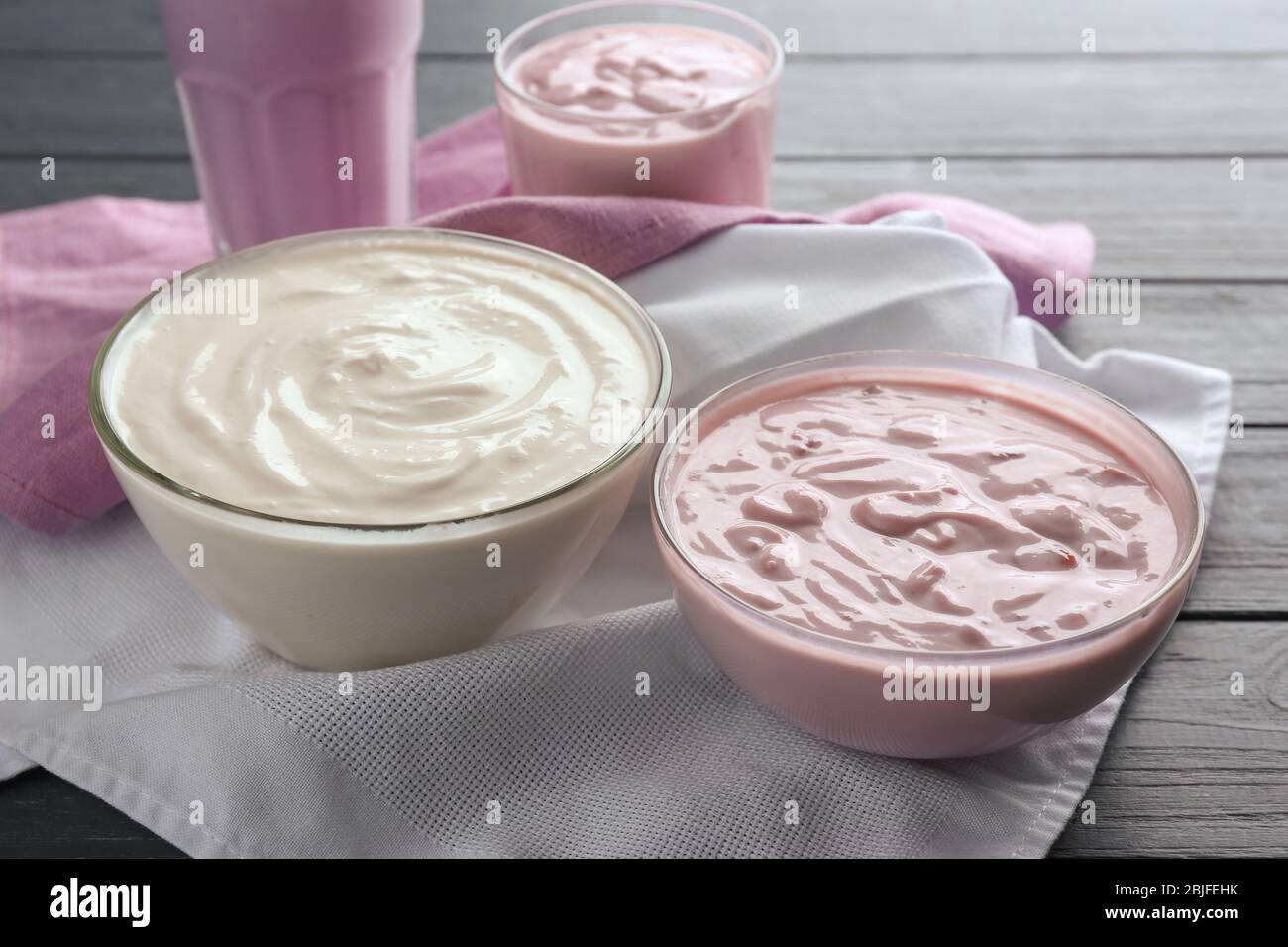 Dishes with homemade yogurt on table Stock Photo - Alamy