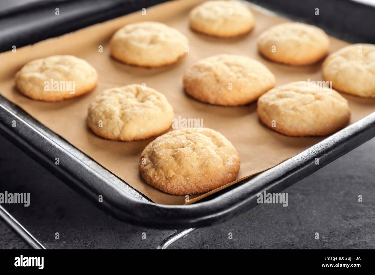 Tasty sugar cookies on tray Stock Photo - Alamy