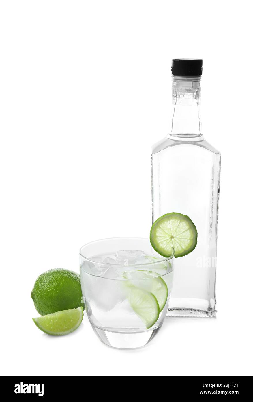 Glass and bottle of tequila on white background Stock Photo - Alamy